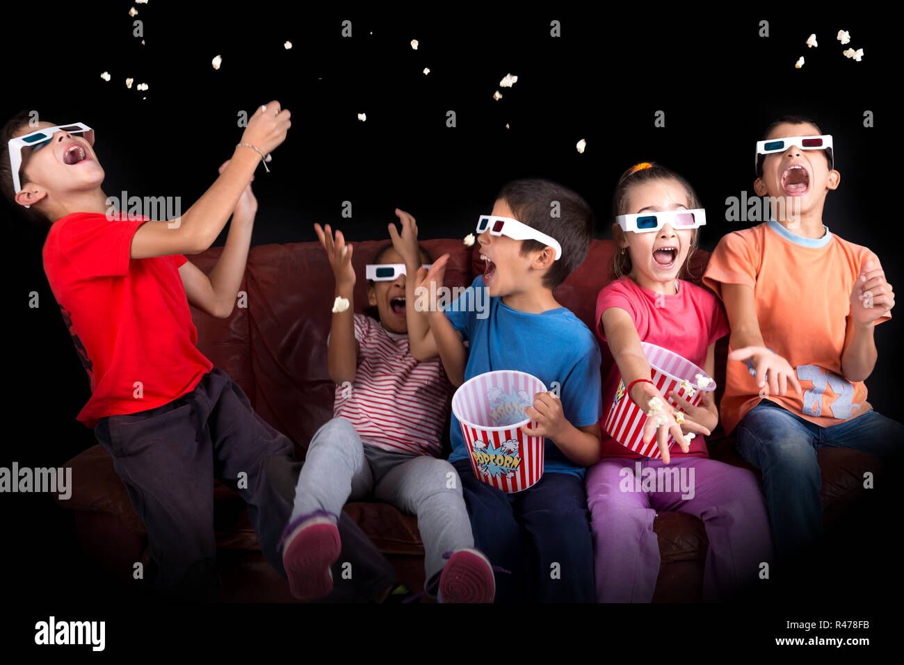 Kids in the movies Stock Photo - Alamy