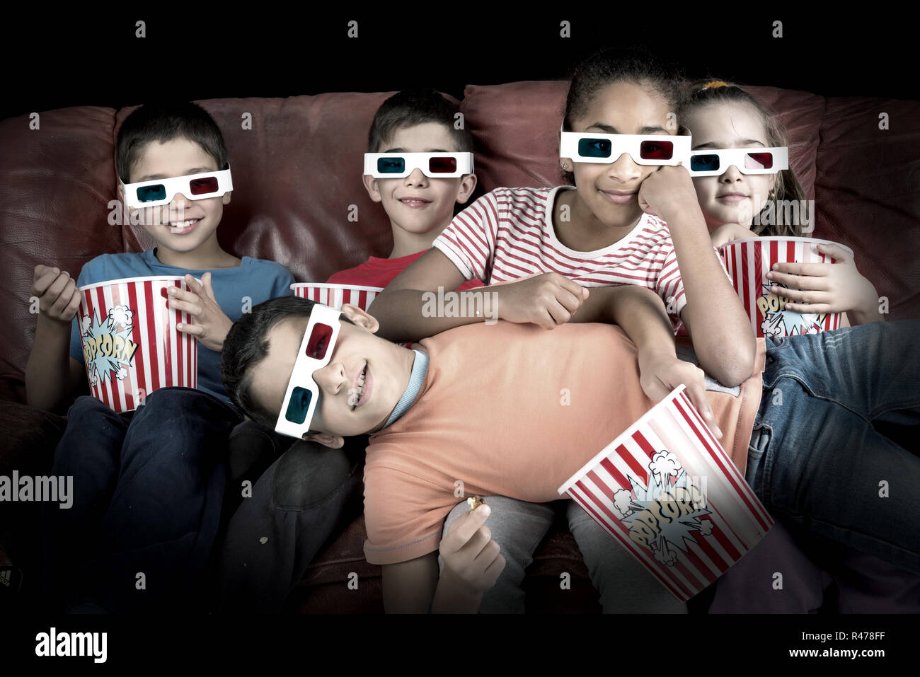 Kids in the movies Stock Photo - Alamy
