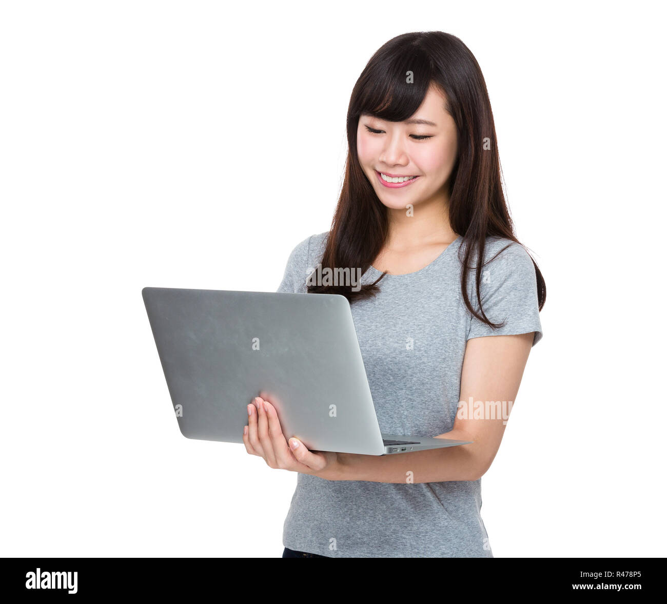 Asian Young woman watch on the laptop computer Stock Photo - Alamy