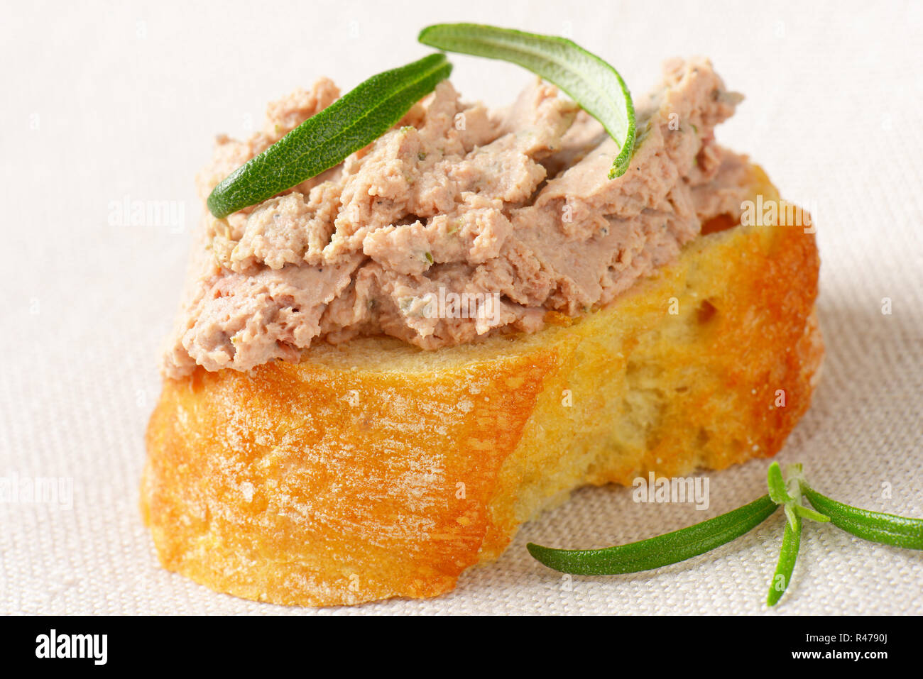 Slice of bread with liver spread Stock Photo - Alamy