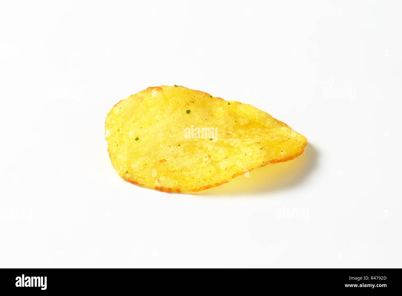 Single potato chip Stock Photo - Alamy