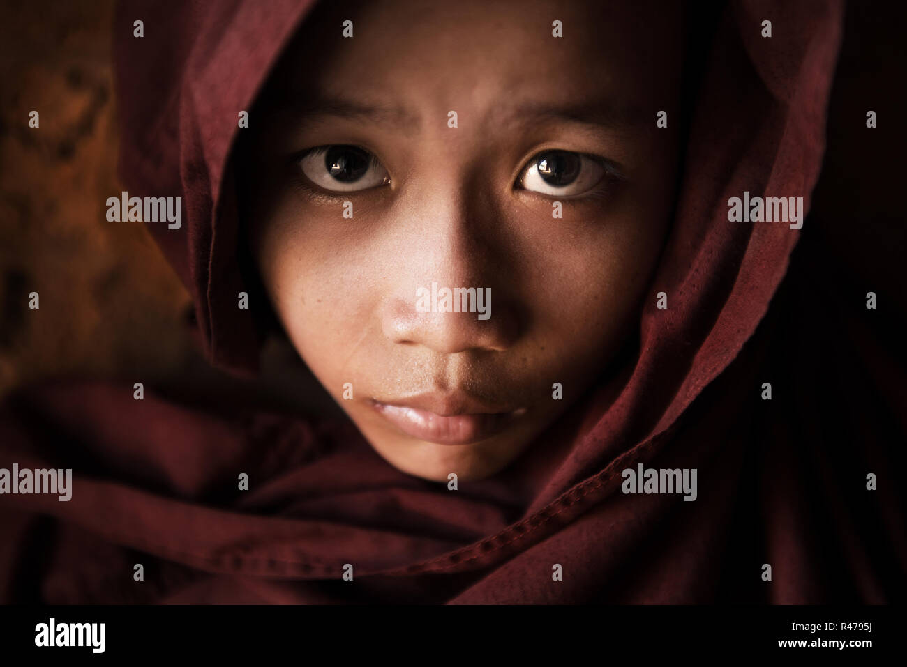 Buddhist novice monk face Stock Photo - Alamy