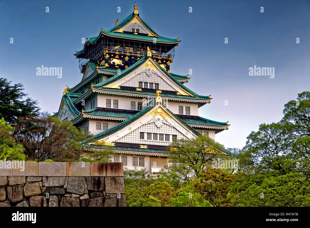 Osaka Castle at sunset in Japan Stock Photo - Alamy