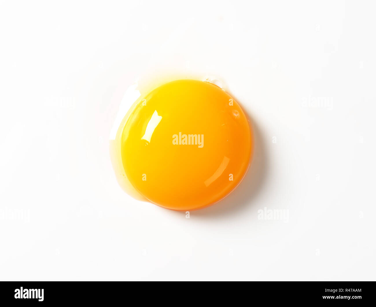 Raw egg yolk Stock Photo - Alamy