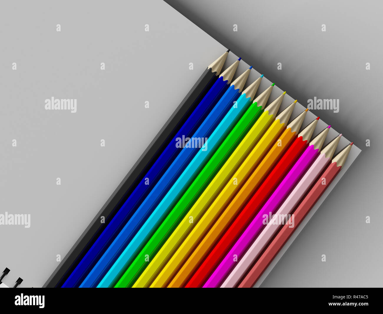 notebook with colored pencils on White background Stock Photo - Alamy