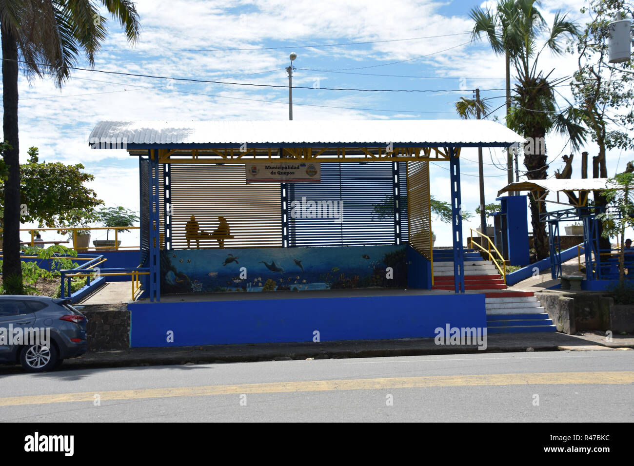Bus stop along the beach facing street in Quepos, Costa Rica Stock ...