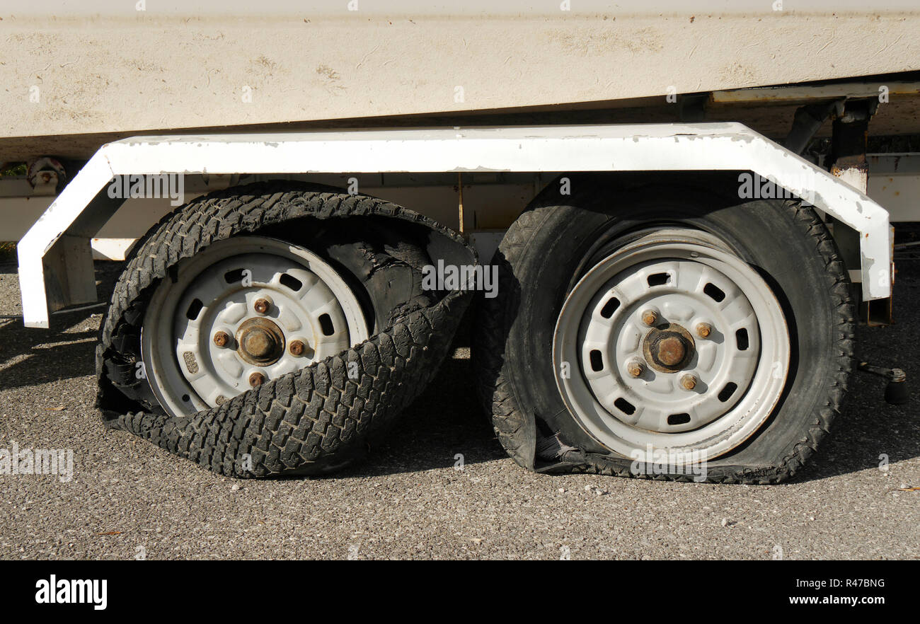 two tires totally destroyed on trailer Stock Photo - Alamy