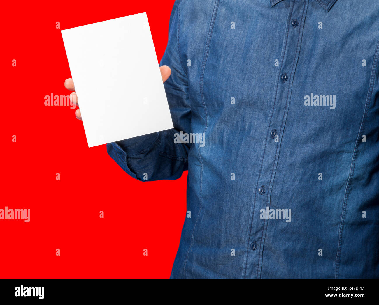 man holding a sign Stock Photo - Alamy
