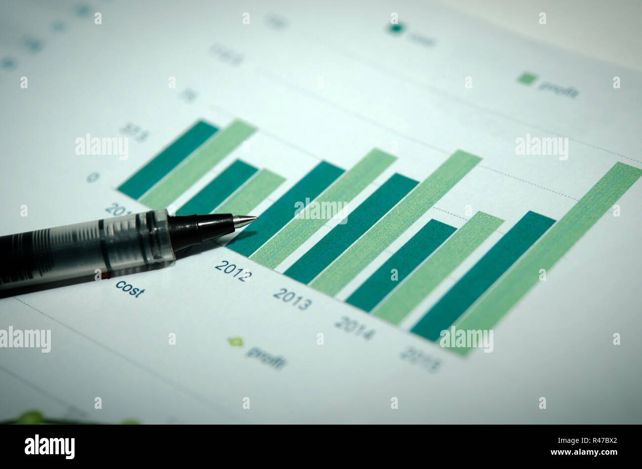 Graphs and pen Stock Photo - Alamy