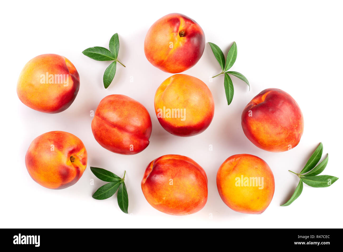 ripe nectarine with leaves isolated on white background. Top view. Flat ...