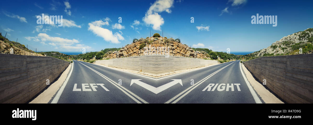 Crossroad fork junction, road splitted in two different ways. Choosing ...