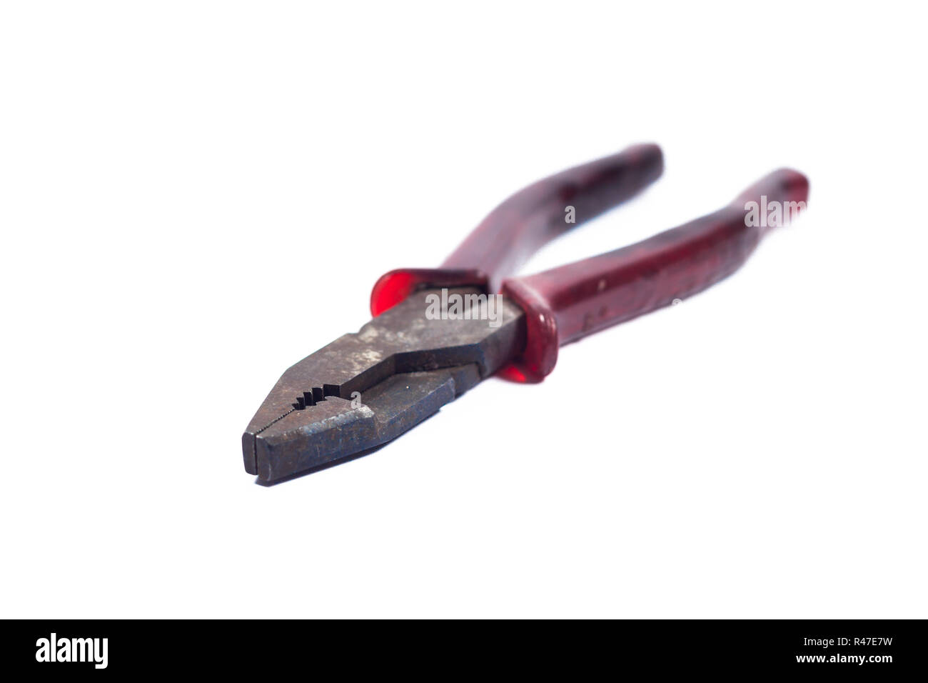 Red pliers closeup on white background Stock Photo - Alamy