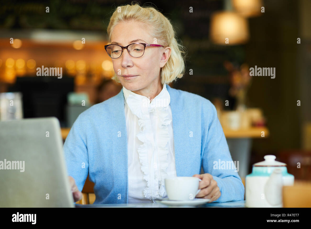 Serious mature woman having hi-res stock photography and images - Alamy