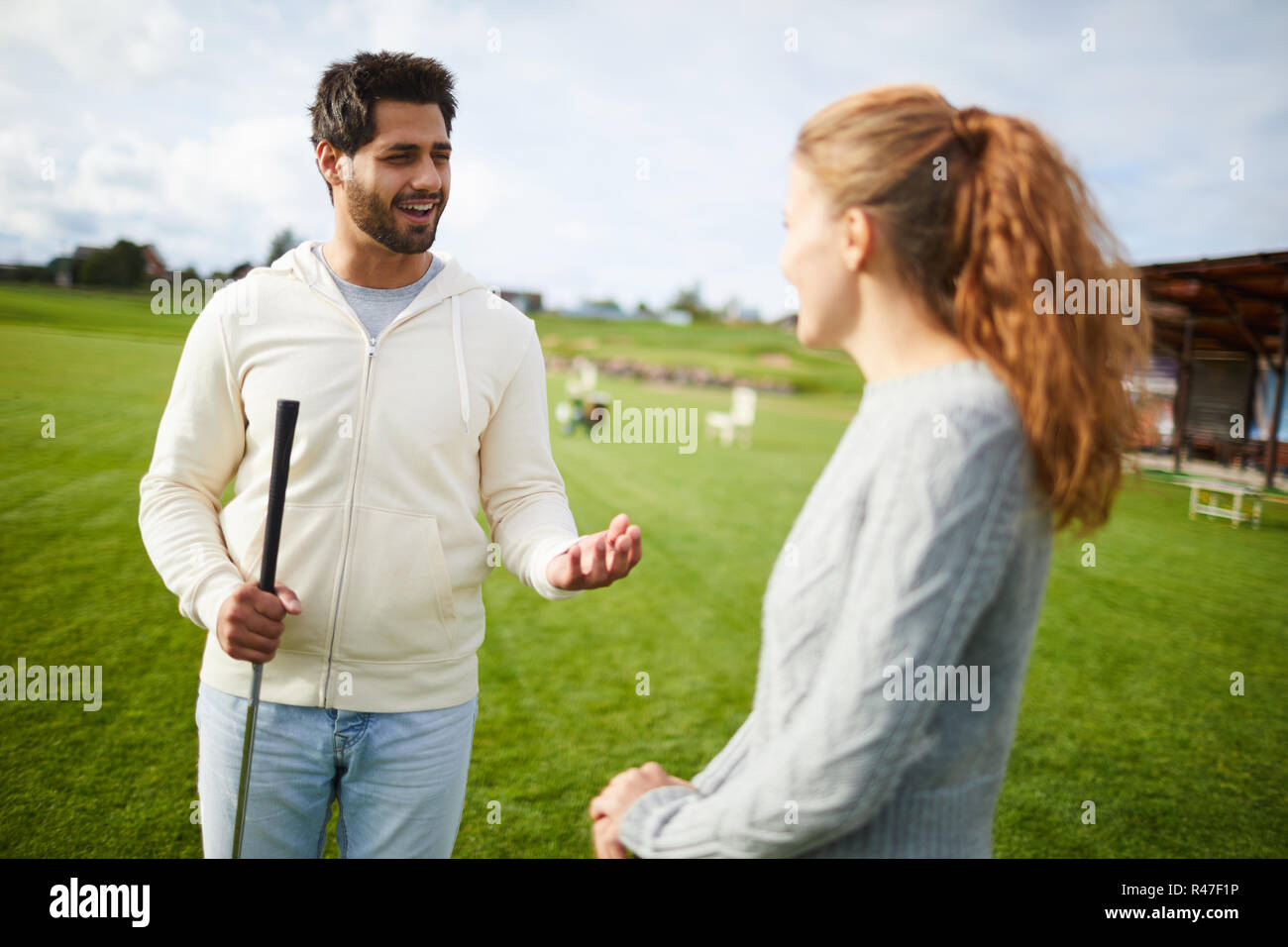 Talk of golfers Stock Photo - Alamy