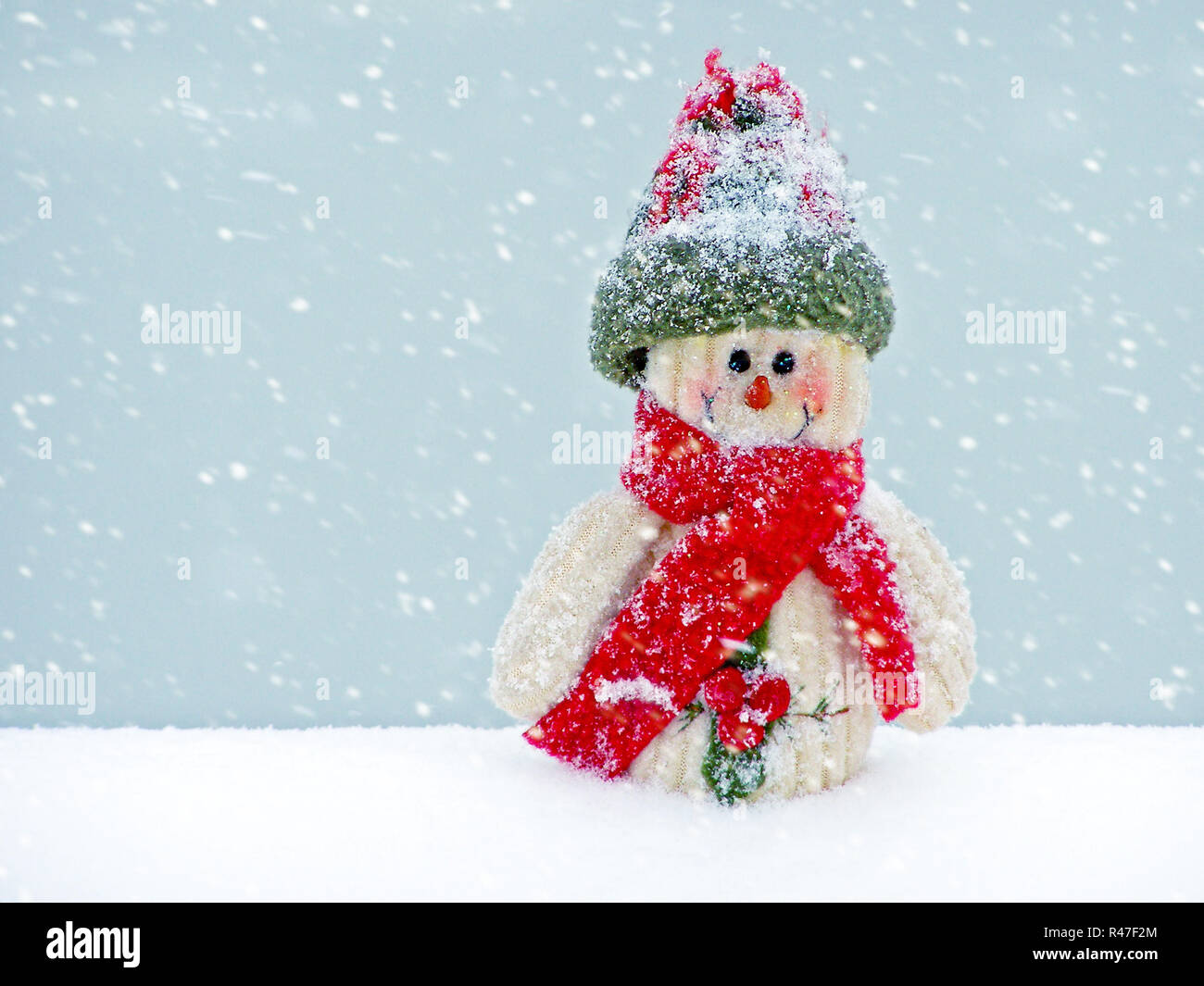 Merry Christmas postcard with a snowman in the snow Stock Photo - Alamy