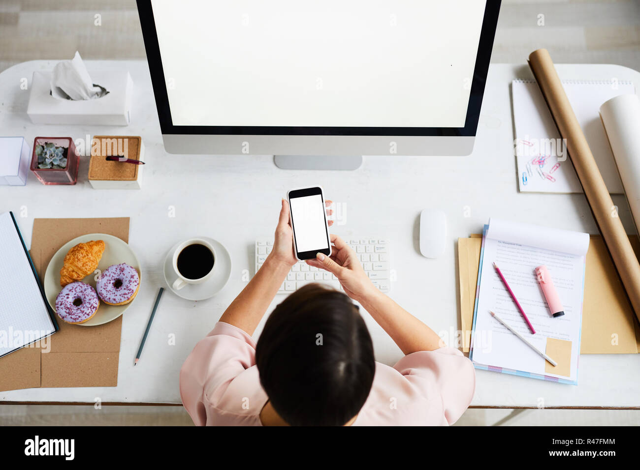 Texting by computer Stock Photo - Alamy