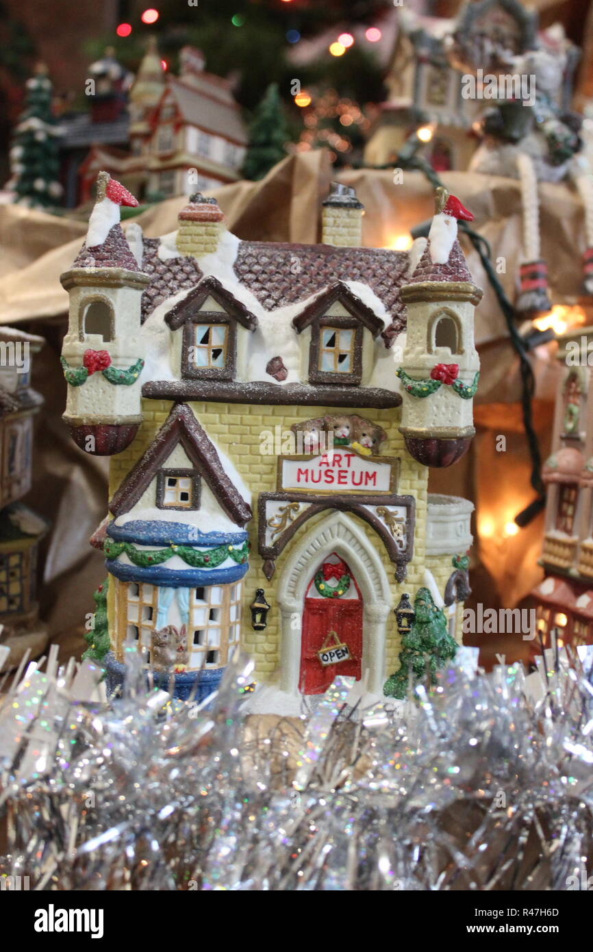 Miniature art museum displayed as Christmas holiday ornamental ...