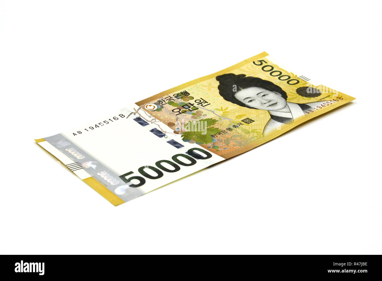 Korean Won currency bills isolated on white background Stock Photo - Alamy