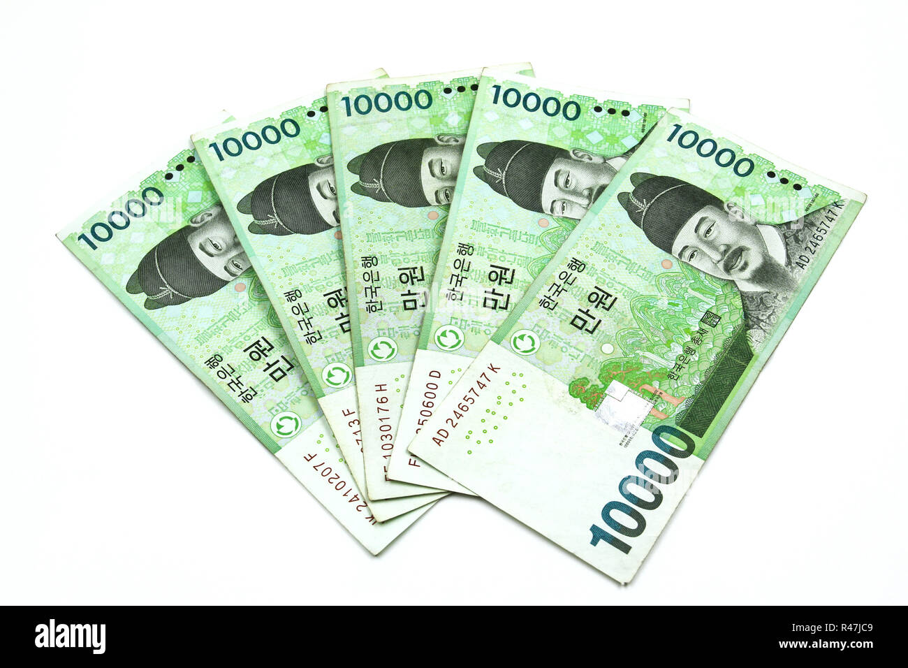 Korean Won currency bills isolated on white background Stock Photo - Alamy