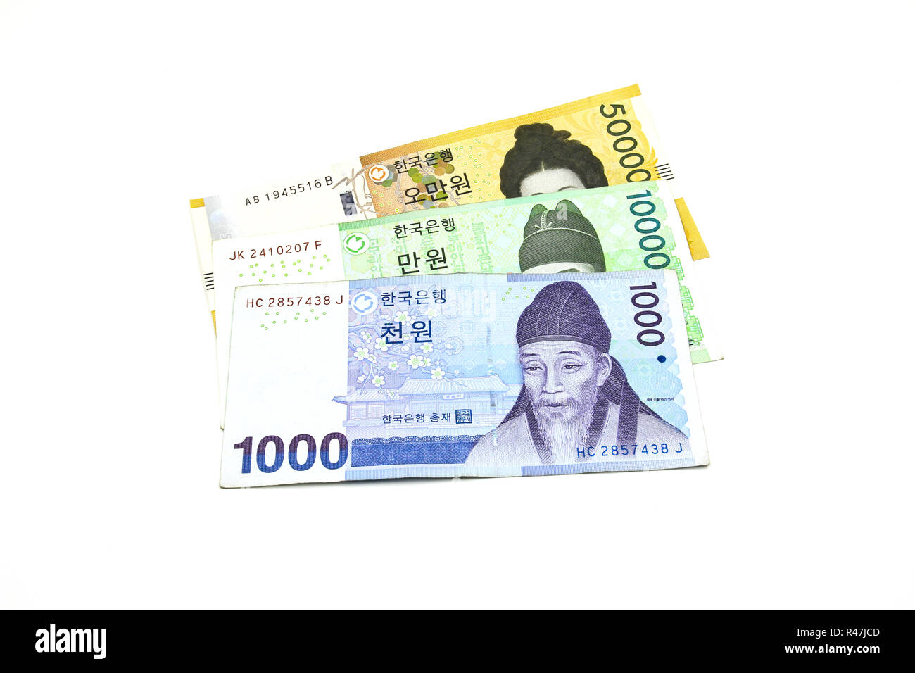 Korean Won currency bills isolated on white background Stock Photo - Alamy