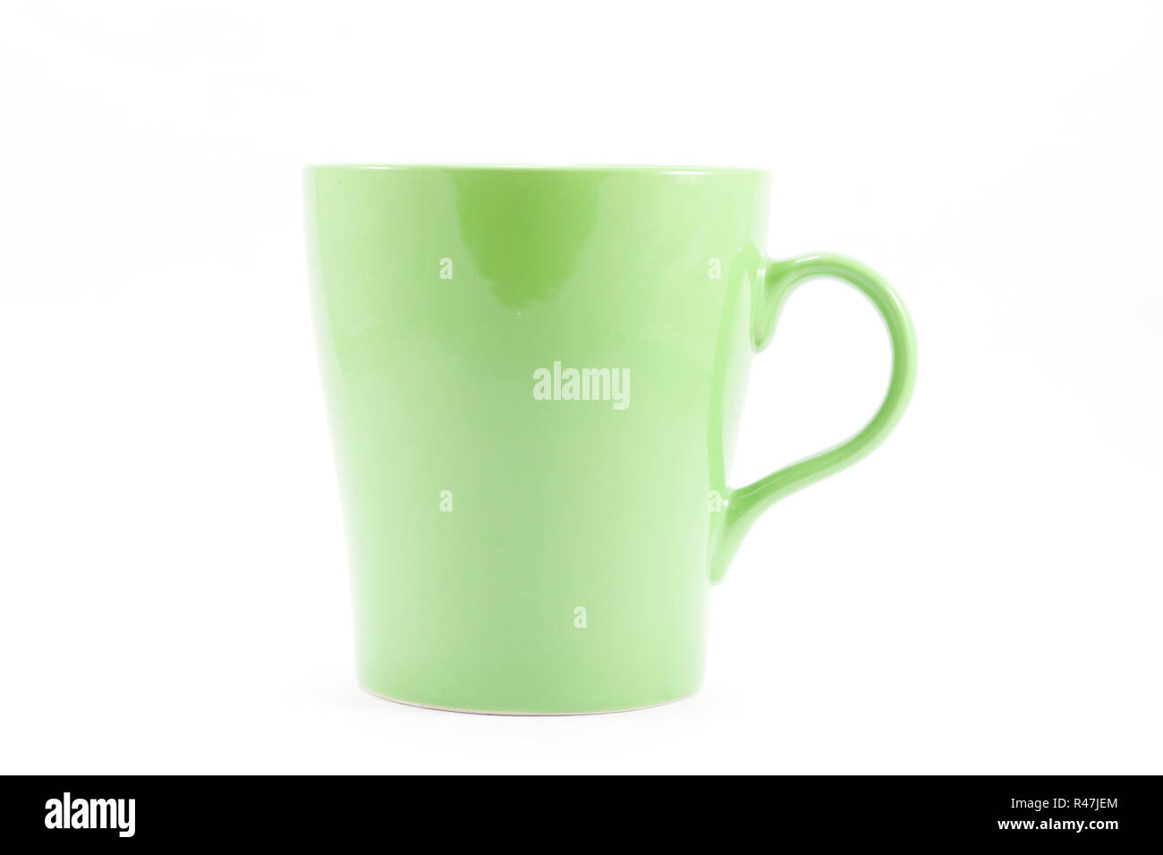 Green mug isolated on white background Stock Photo - Alamy