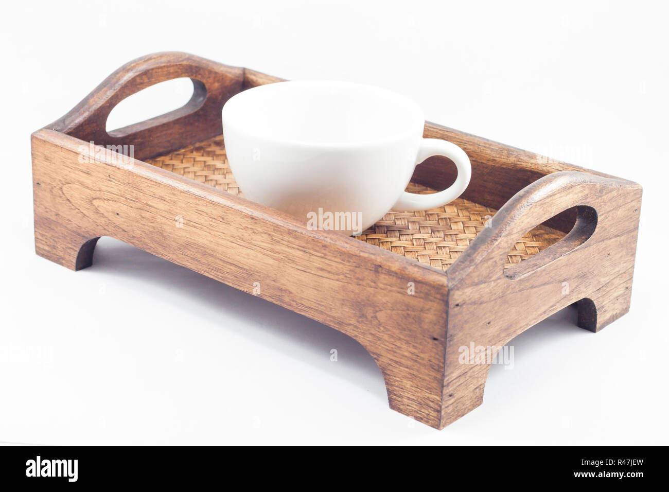 Coffee cup on wooden tray isolated on white background Stock Photo - Alamy