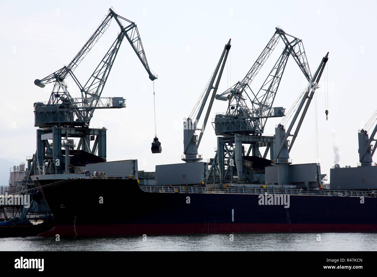 cargo ship loading in coal cargo terminal Stock Photo - Alamy