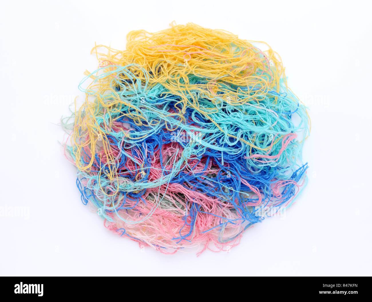 tangled yarn on white background Stock Photo - Alamy