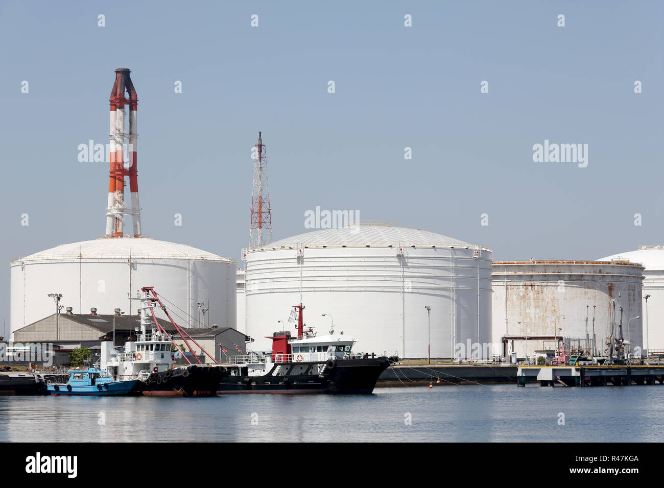 Oil tanks, industrial area Stock Photo - Alamy