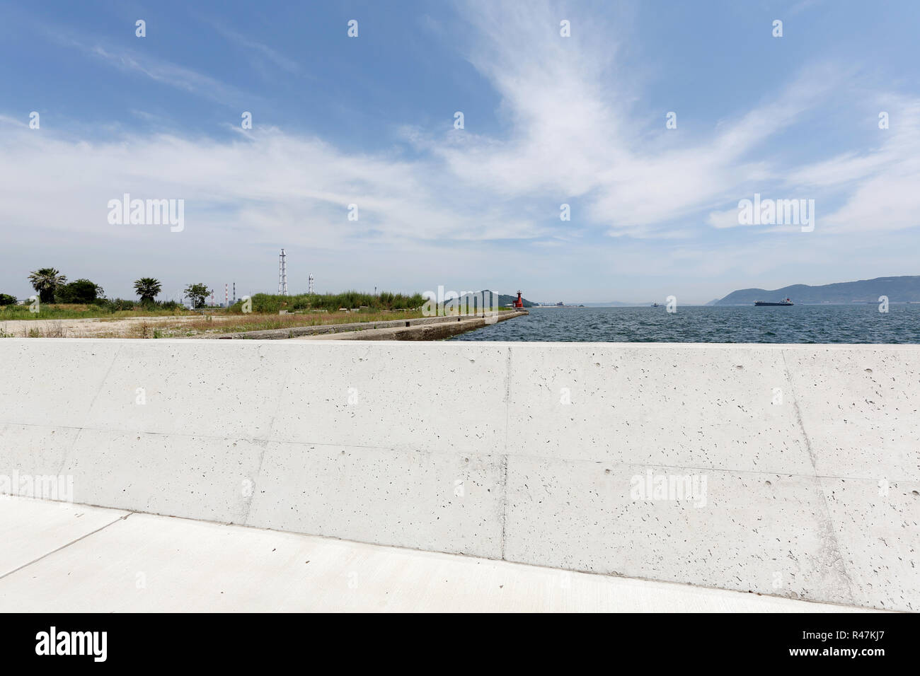 concrete breakwater of the port Stock Photo - Alamy