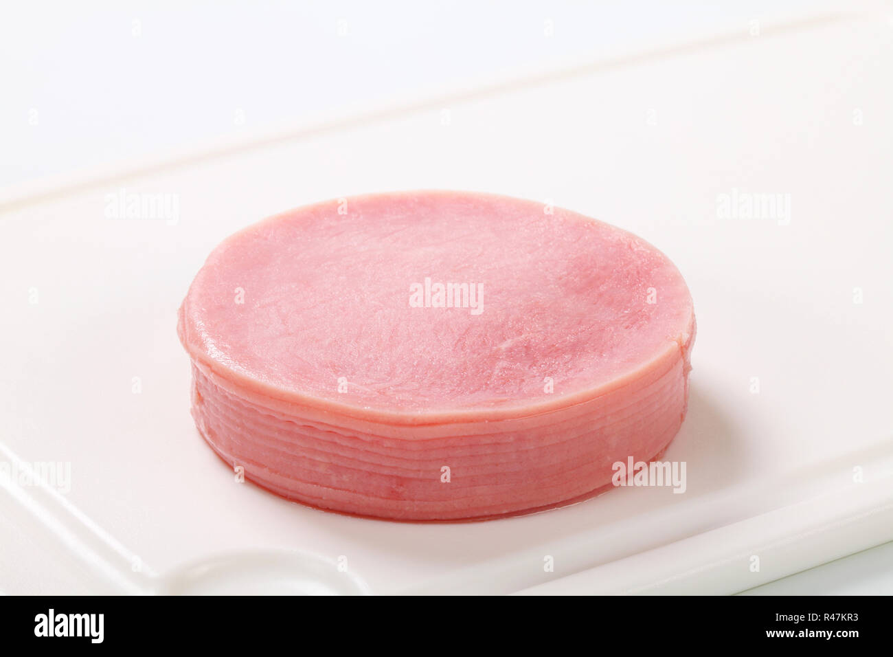 Thin slices of ham Stock Photo - Alamy
