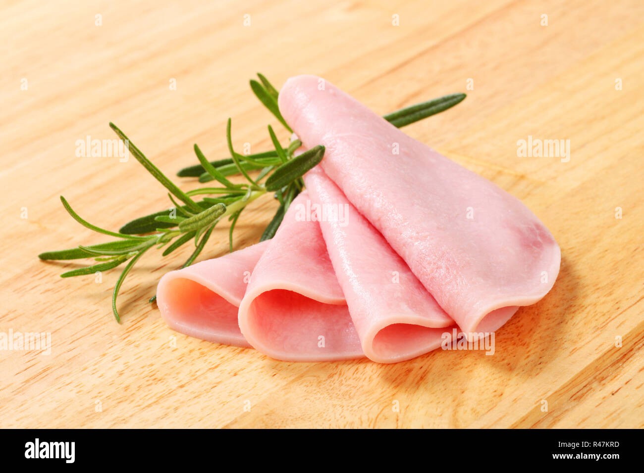 Thin slices of ham Stock Photo - Alamy