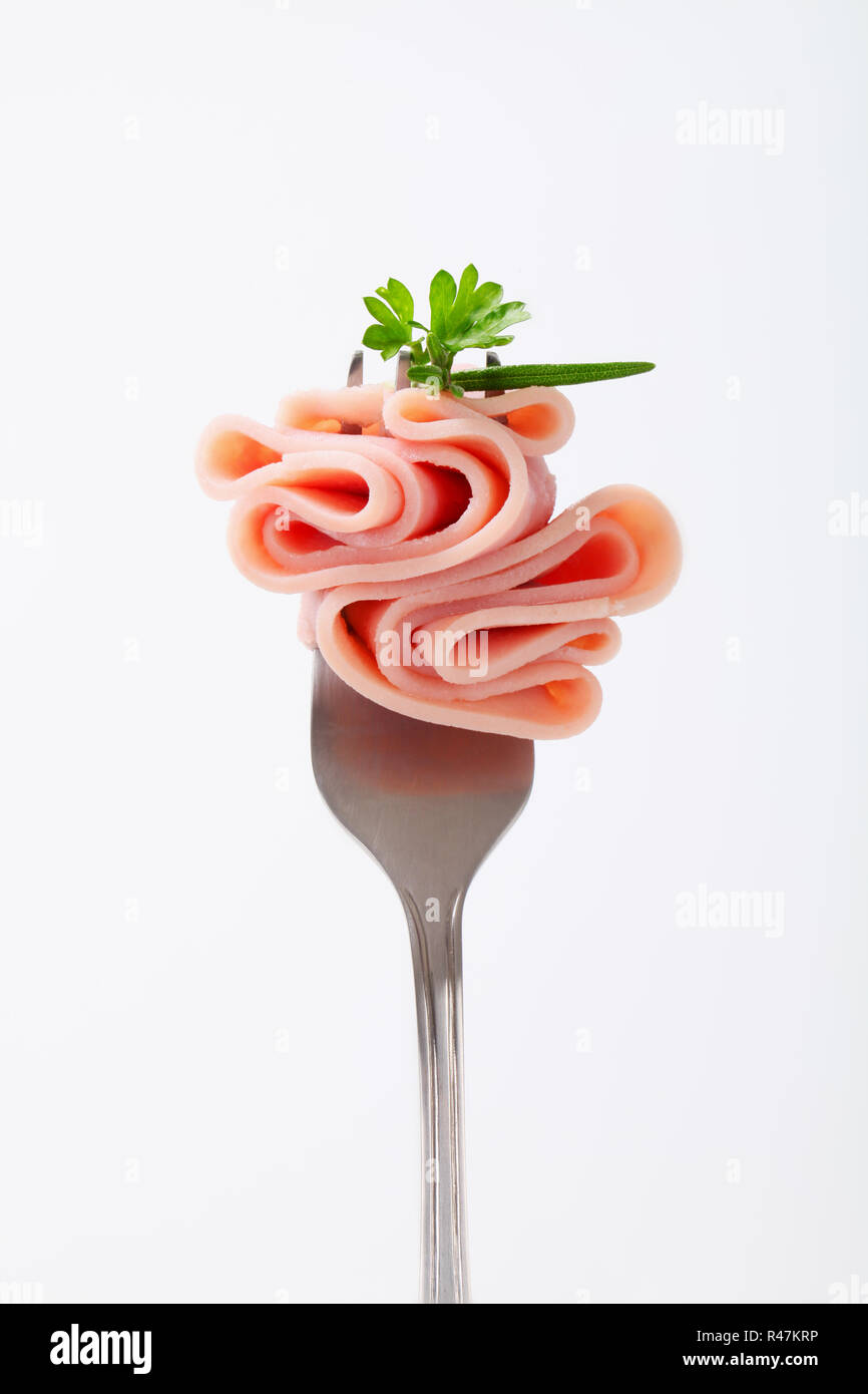 slice of ham on a fork Stock Photo - Alamy