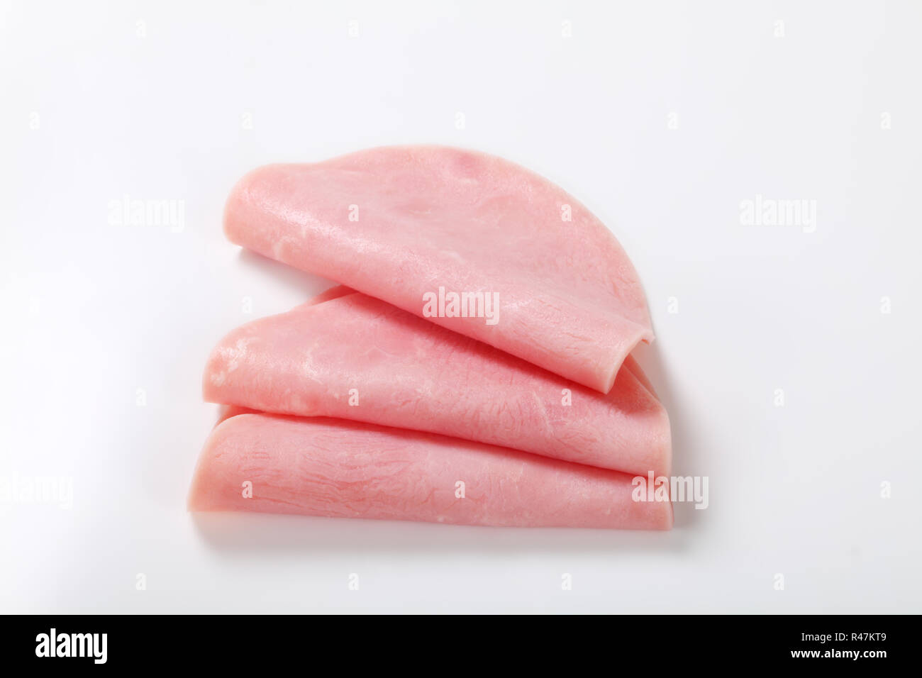 Thin slices of ham Stock Photo - Alamy