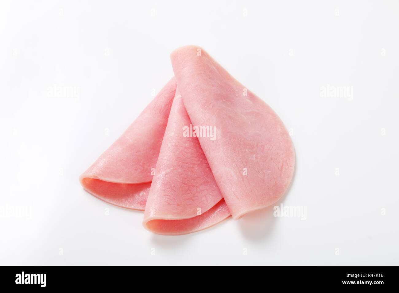 Thin slices of ham Stock Photo - Alamy