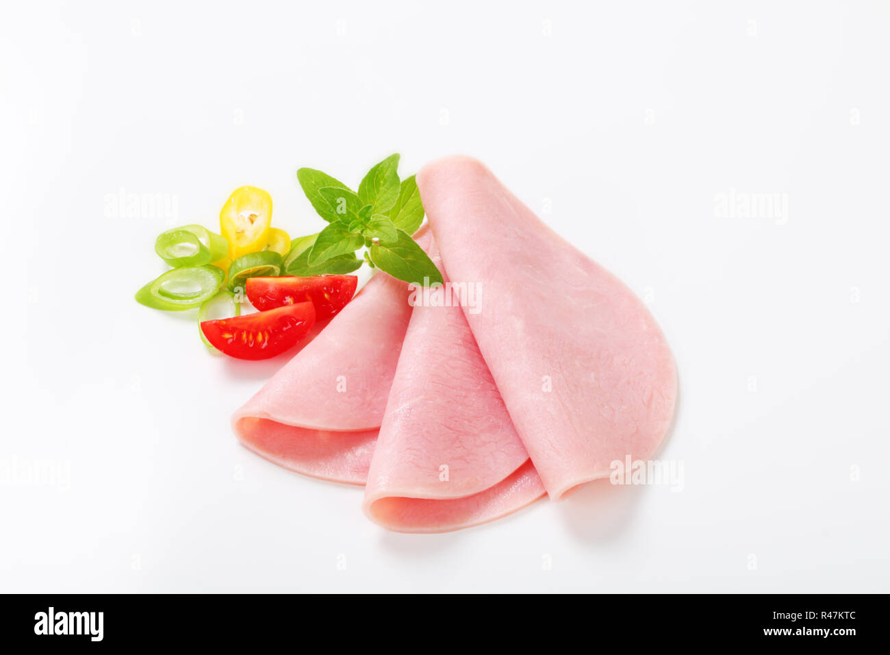 Thin slices of ham Stock Photo - Alamy