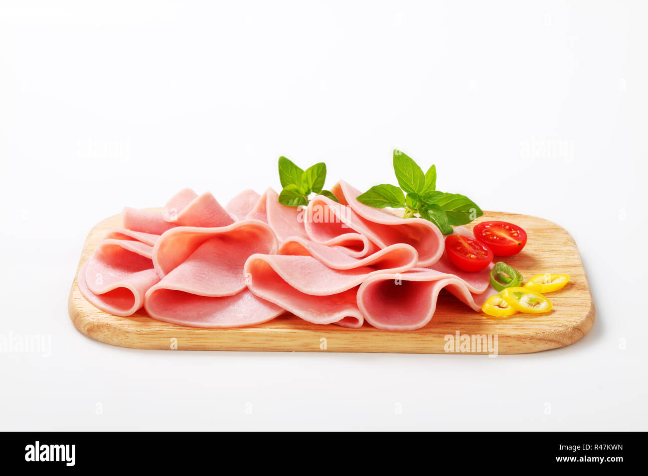 Thin slices of ham Stock Photo - Alamy