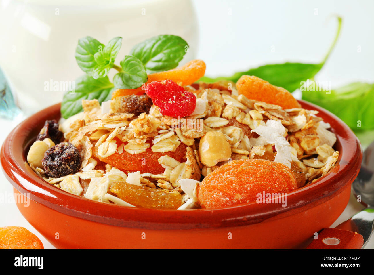 Musli with raisins and nuts hi-res stock photography and images - Alamy