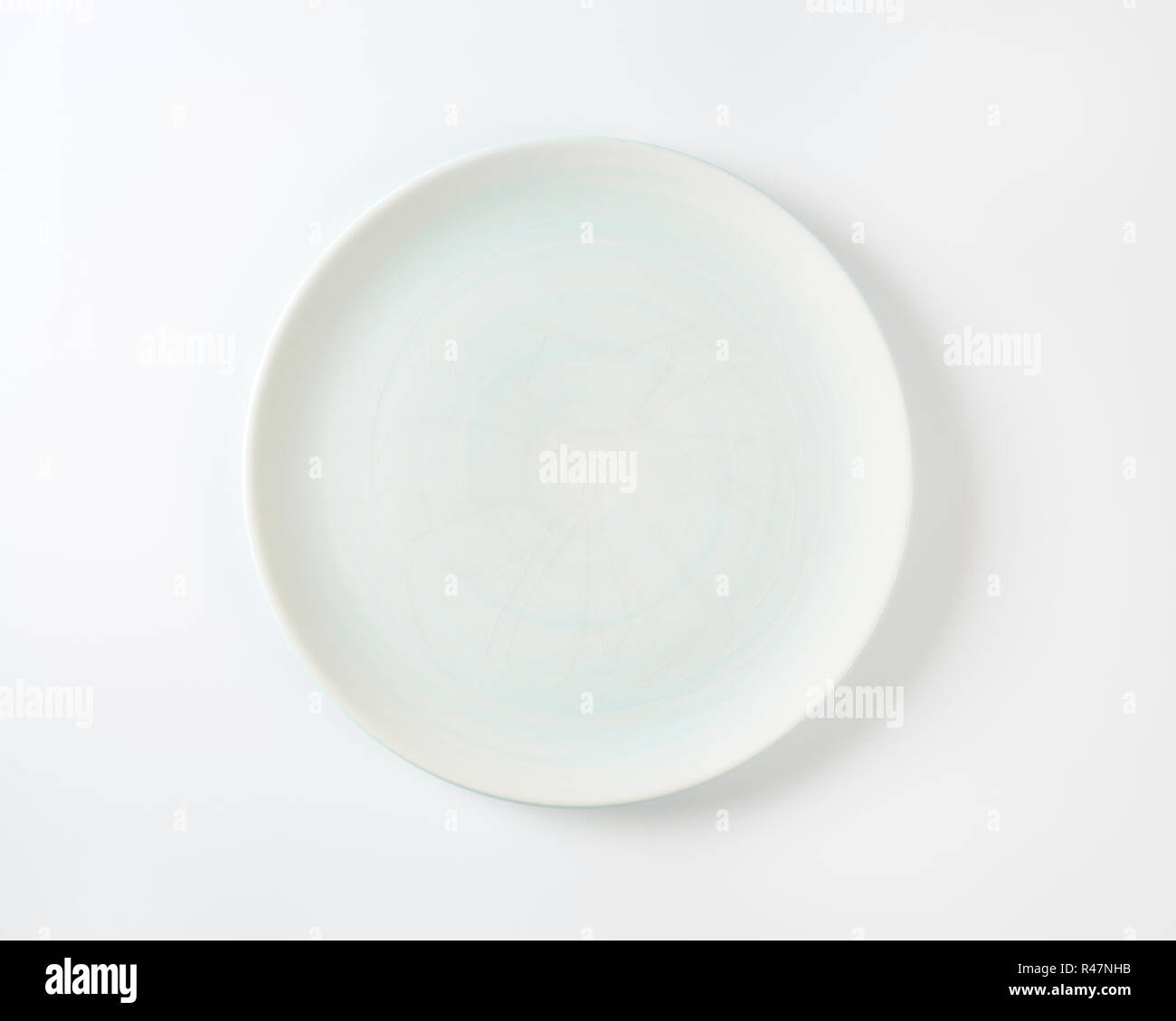 Flat white dinner plate Stock Photo - Alamy