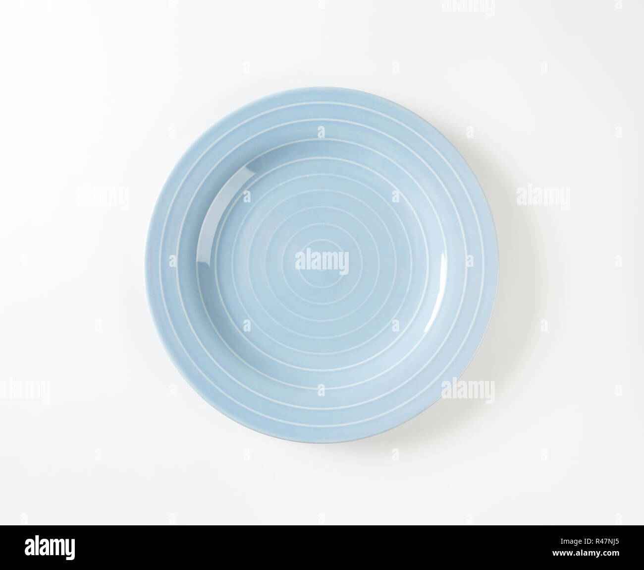 Blue dinner plate Stock Photo - Alamy