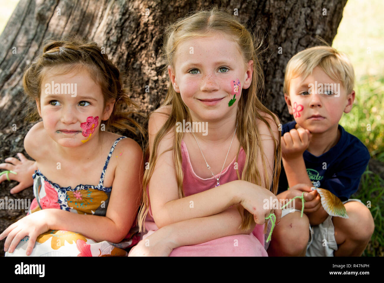 Group portrait of young children with face painting Stock Photo - Alamy