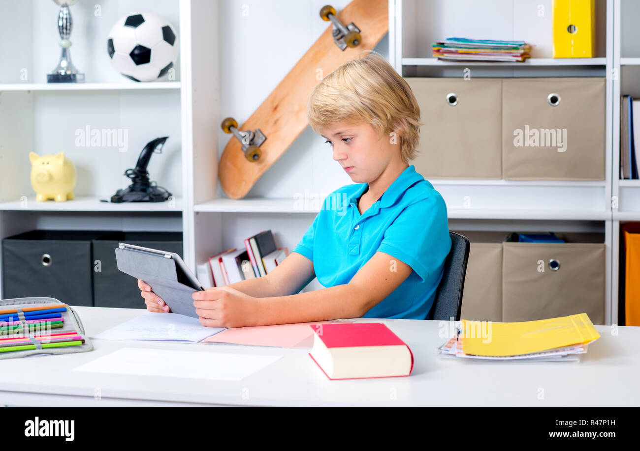 boy is using computer Stock Photo - Alamy