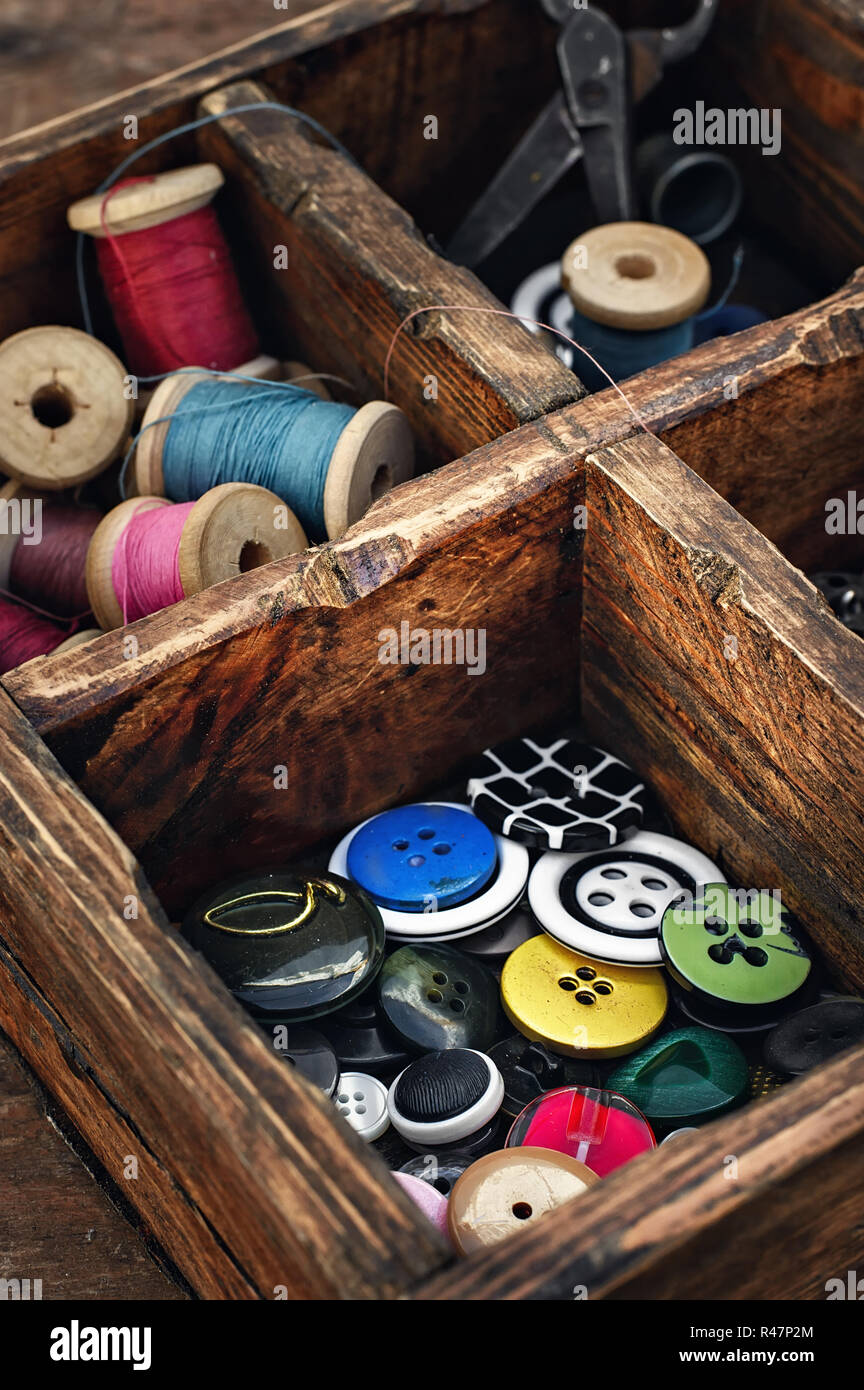 spools of thread and buttons Stock Photo - Alamy