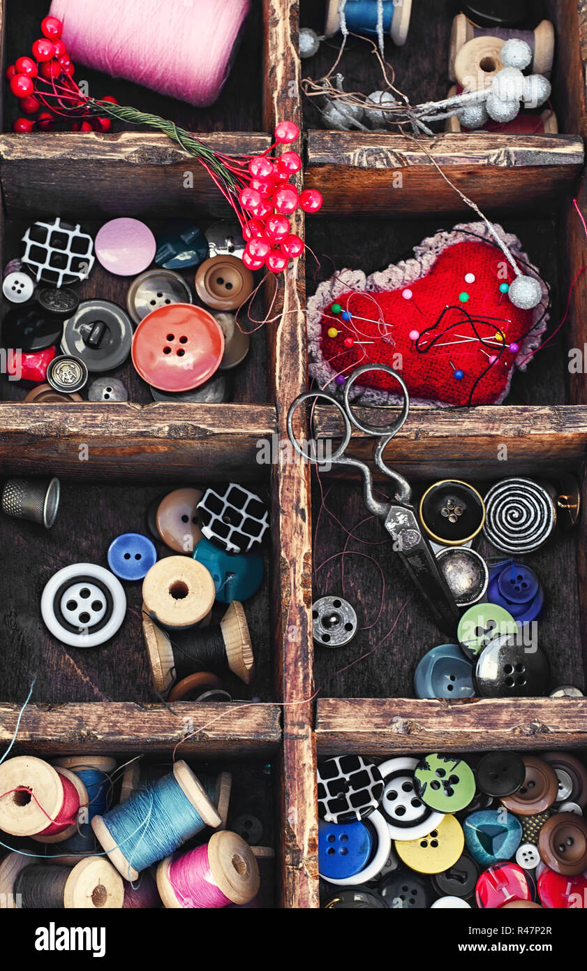 spools of thread and buttons Stock Photo - Alamy
