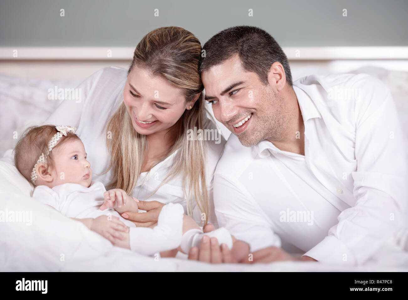Happy family at home Stock Photo - Alamy