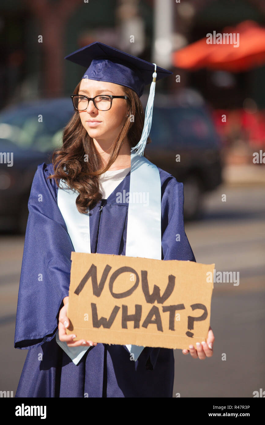Disappointed Graduate with Sign Stock Photo - Alamy