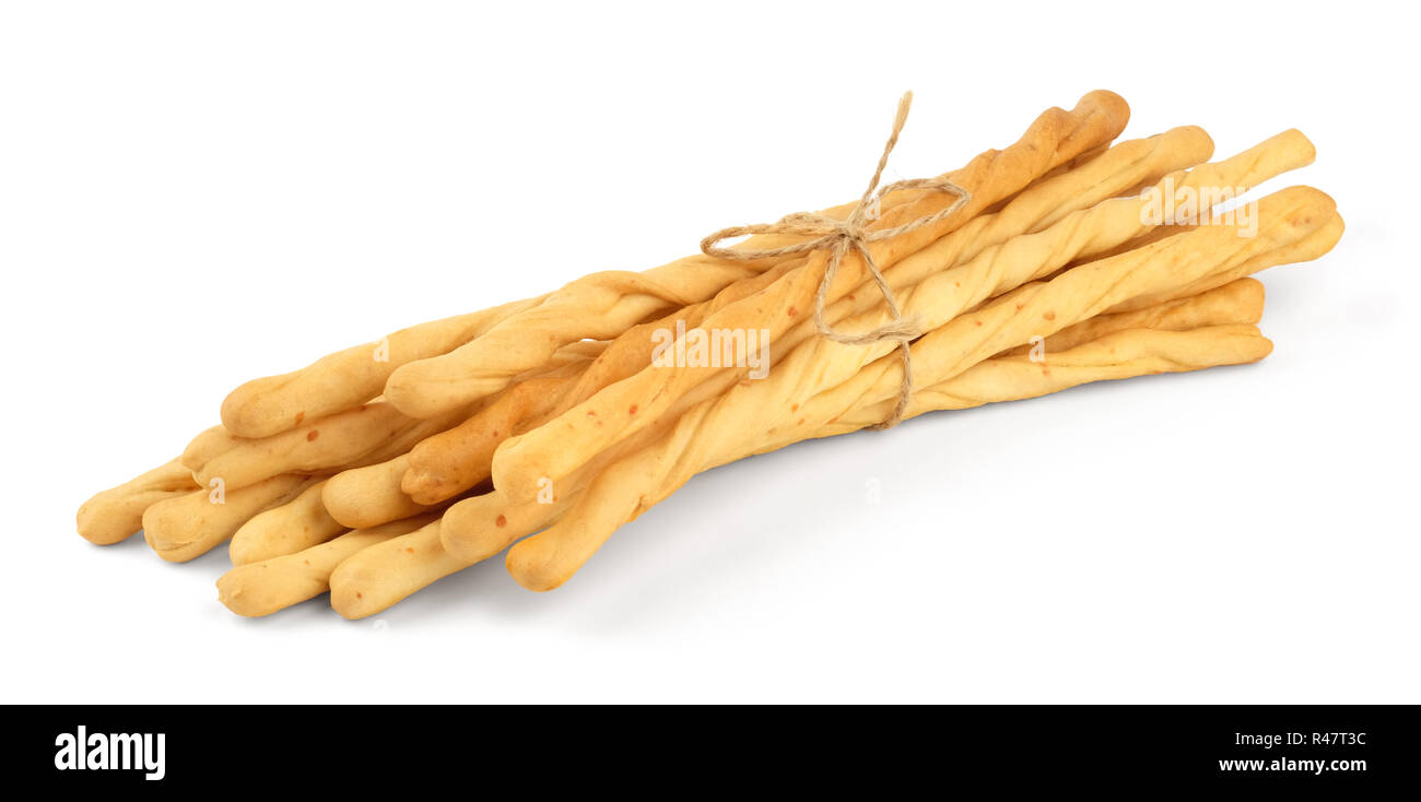 Toasted wheat long bread sticks, tied with a rope, isolated on a white ...