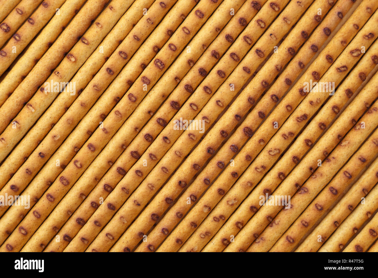 Background from the diagonally long crispy baked straw Stock Photo - Alamy