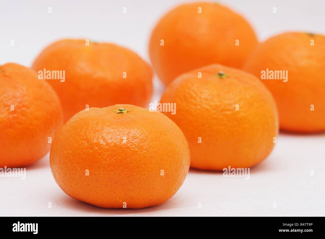 fresh tangerines on white background Stock Photo - Alamy