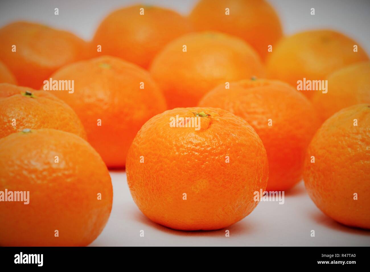 fresh tangerines on white background Stock Photo - Alamy